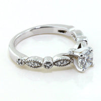 Modish Moissanite Engagement Ring Diamond Accent Stones.